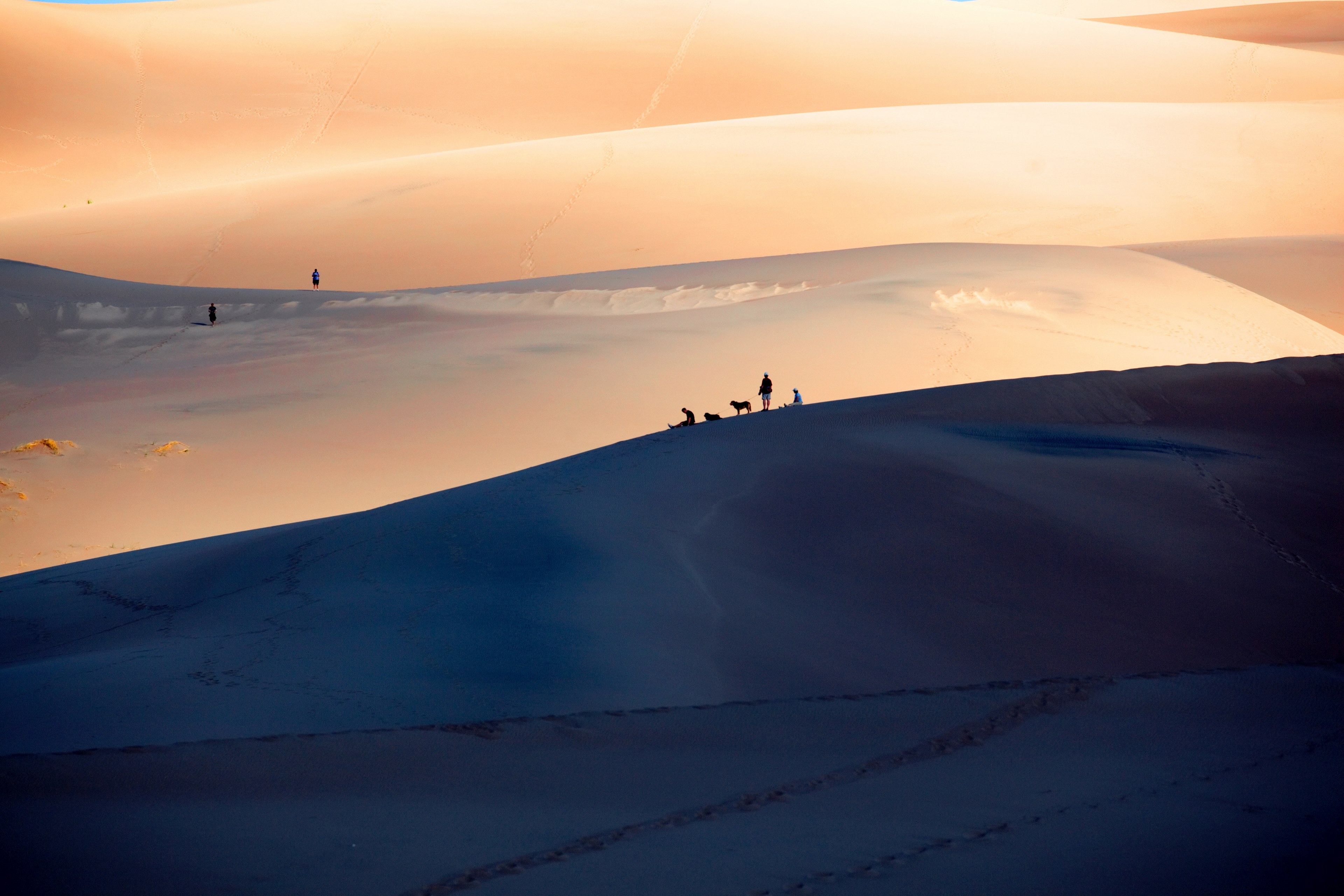 hiking through the desert of great sand dunes national park and ...