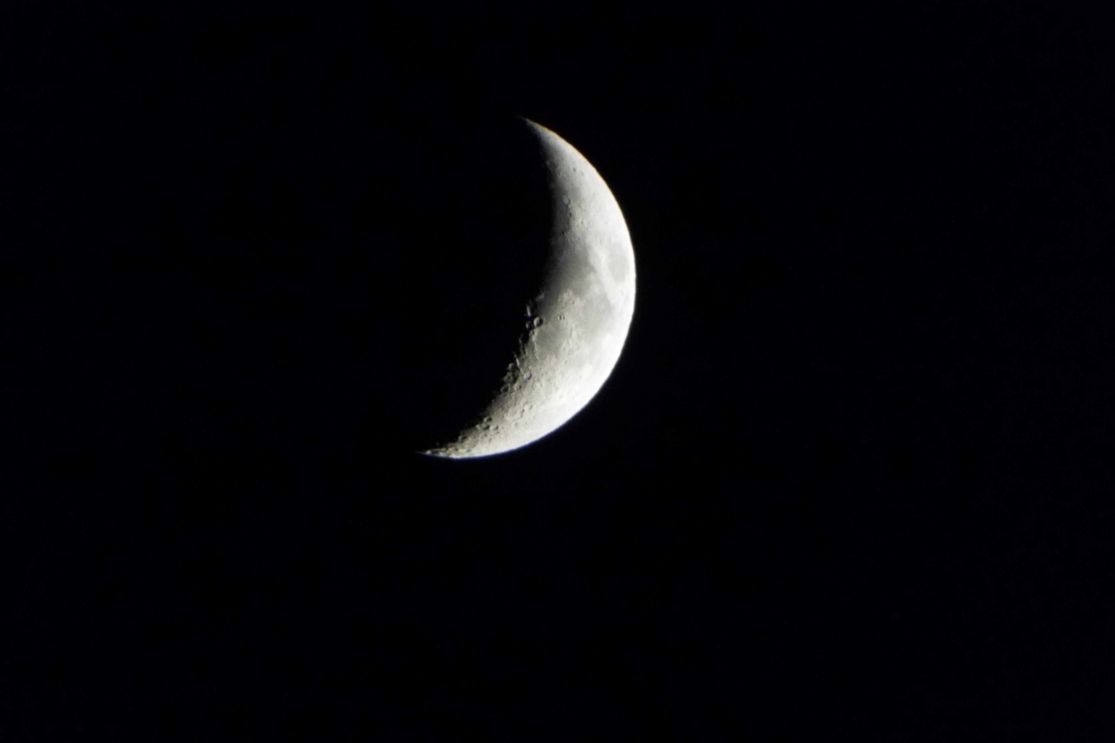 The Moon Appearing As A Crescent During The Eclipse At Rainham, New ...