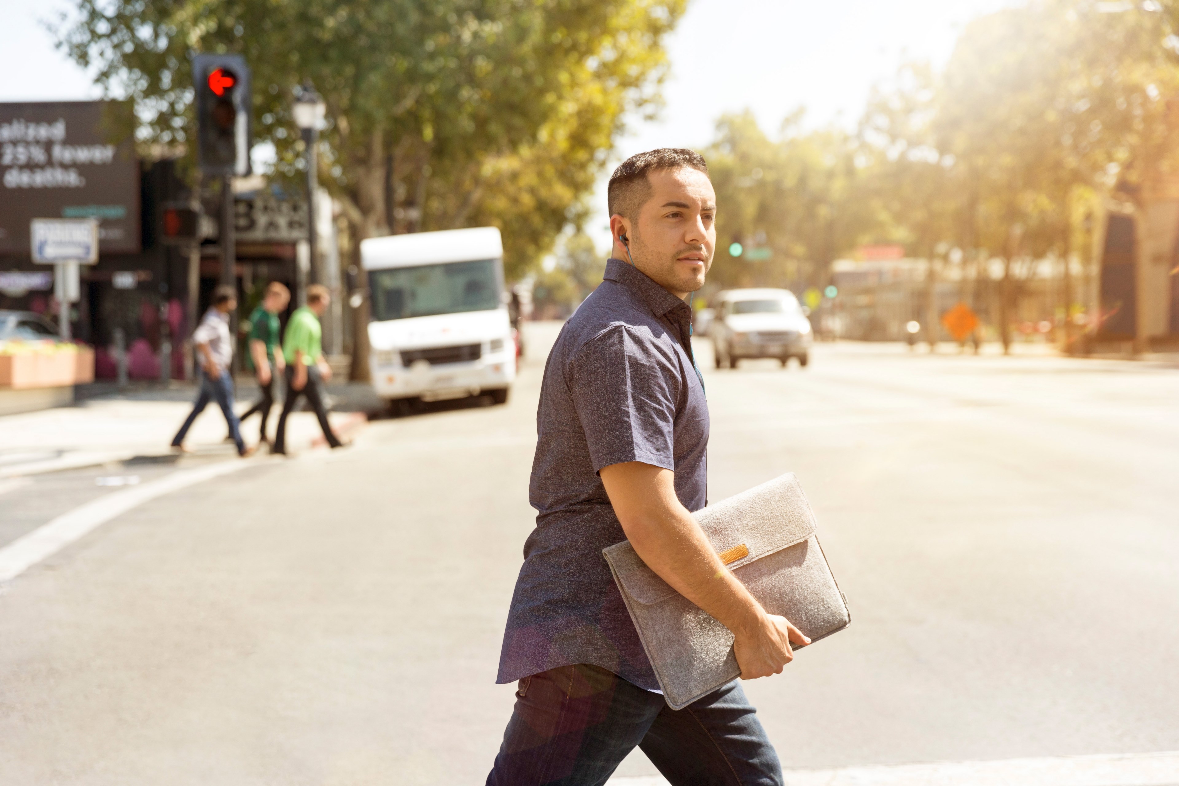 man male laptop and walking 4k HD Wallpaper