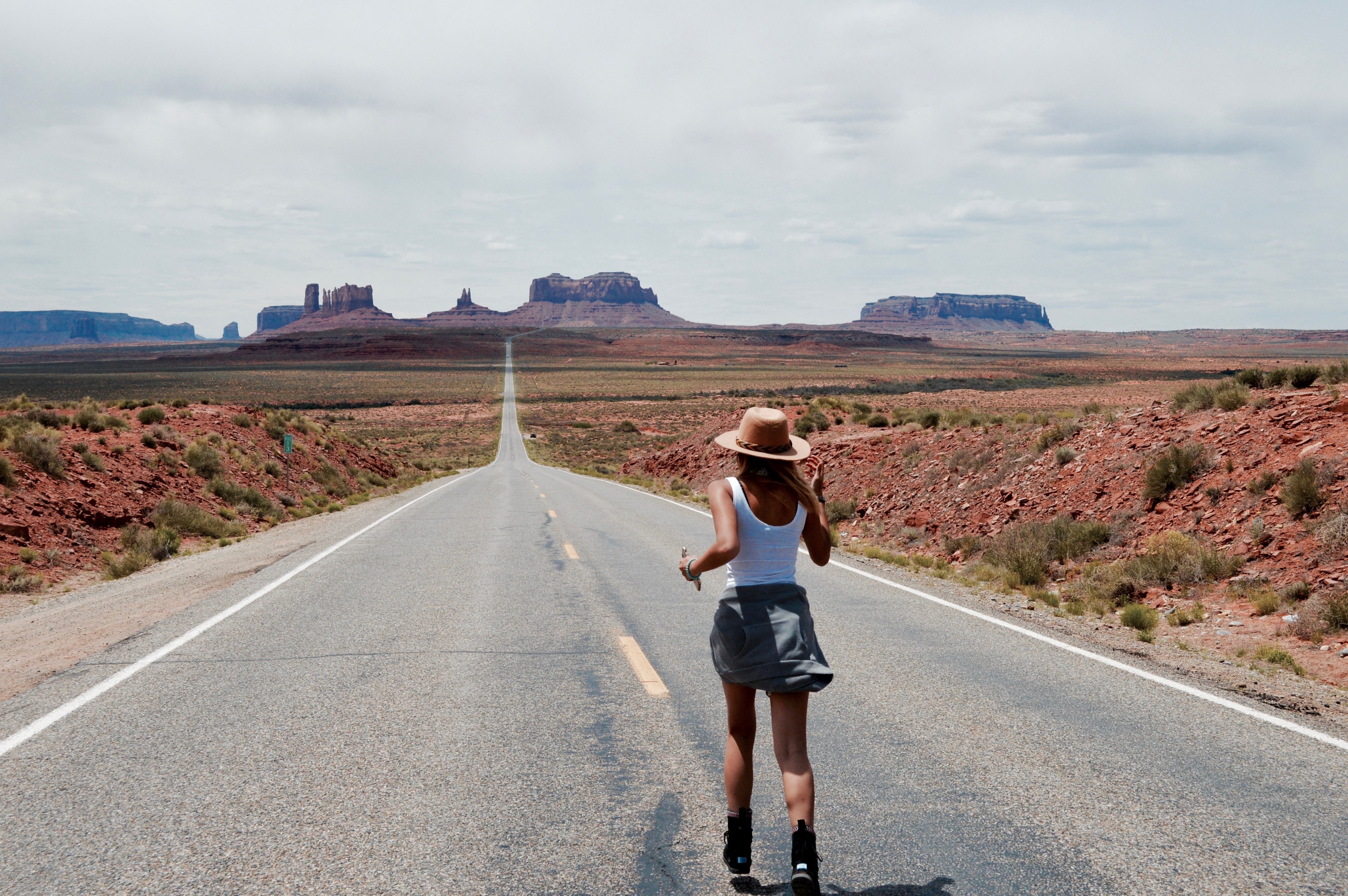 running through monument valley 4k HD Wallpaper