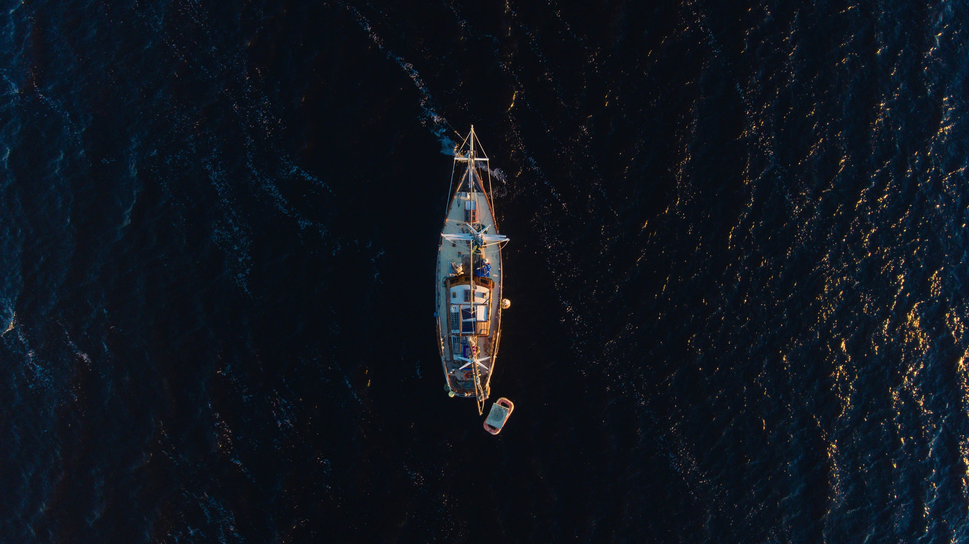 A Drone Shot Of A Boat In The Ocean, Lost At Sea 4K Hd Wallpaper