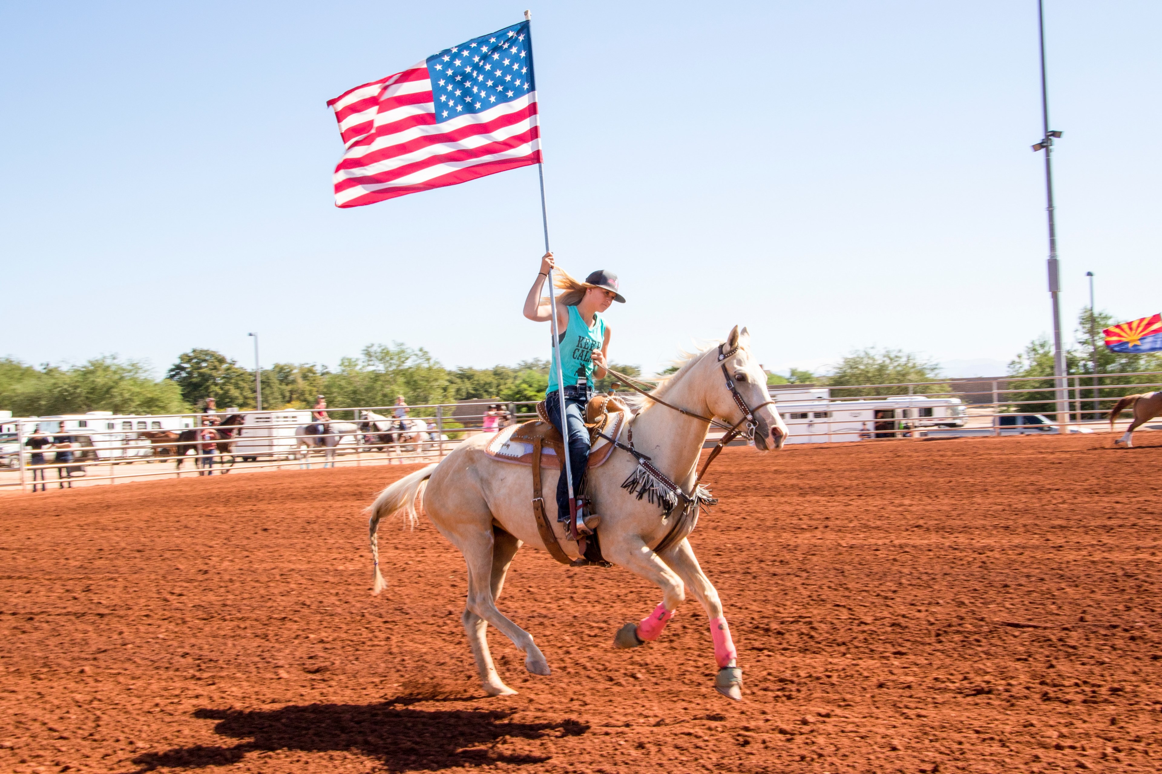 barrel racer carrying american flag 4k HD Wallpaper