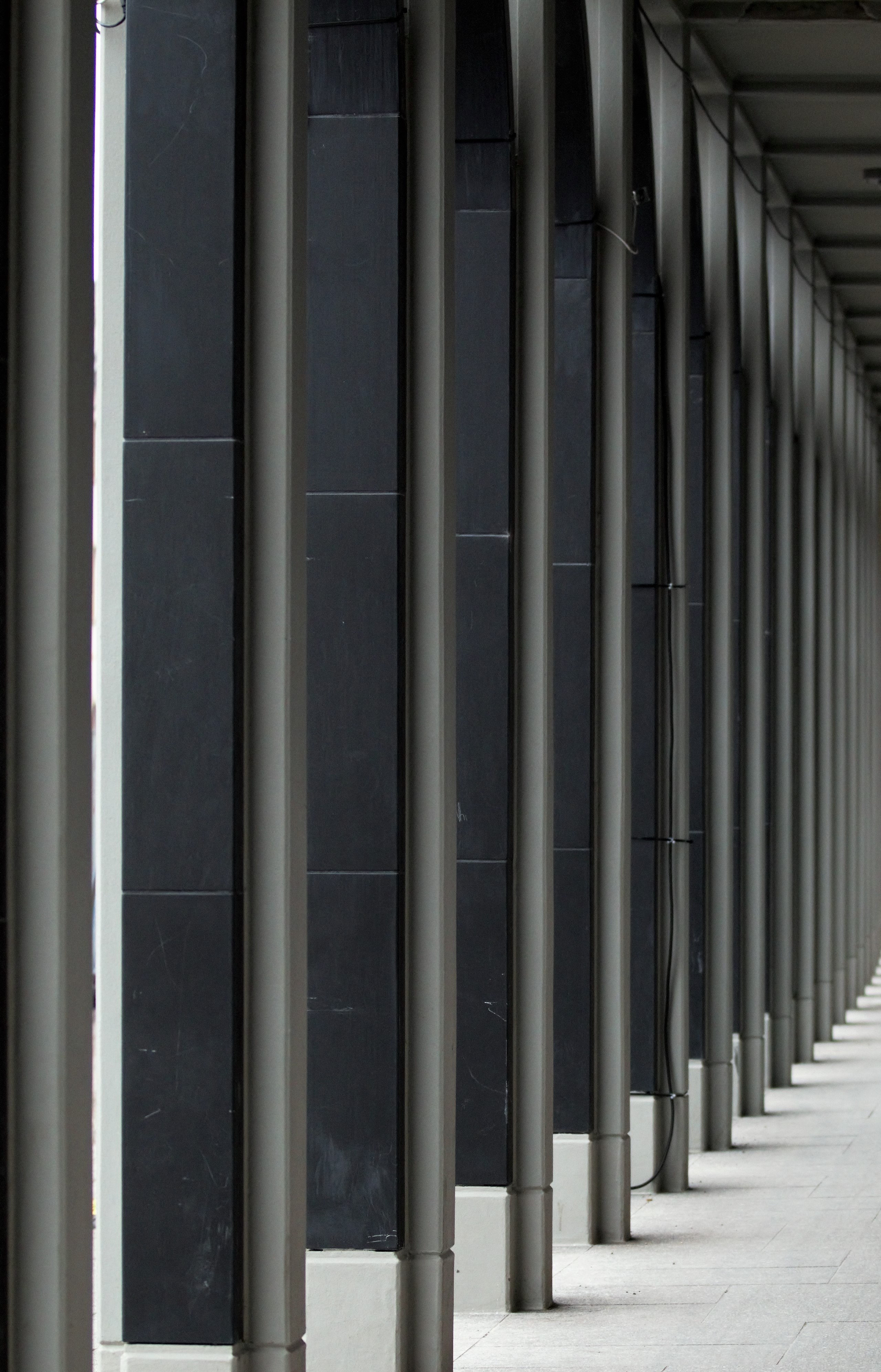 gray architecture lined along a wall inside a building in karlsruhe ...