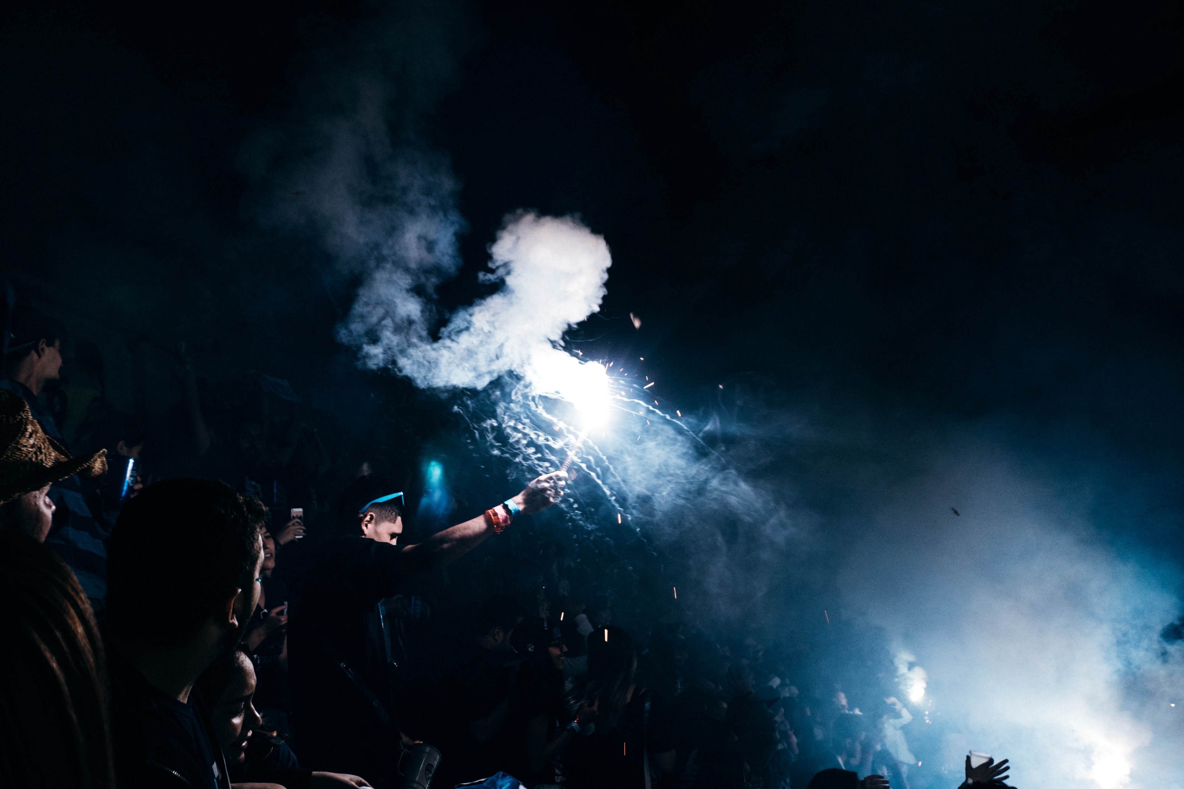 Firework Smoke Crowd And Flare 4K Hd Wallpaper