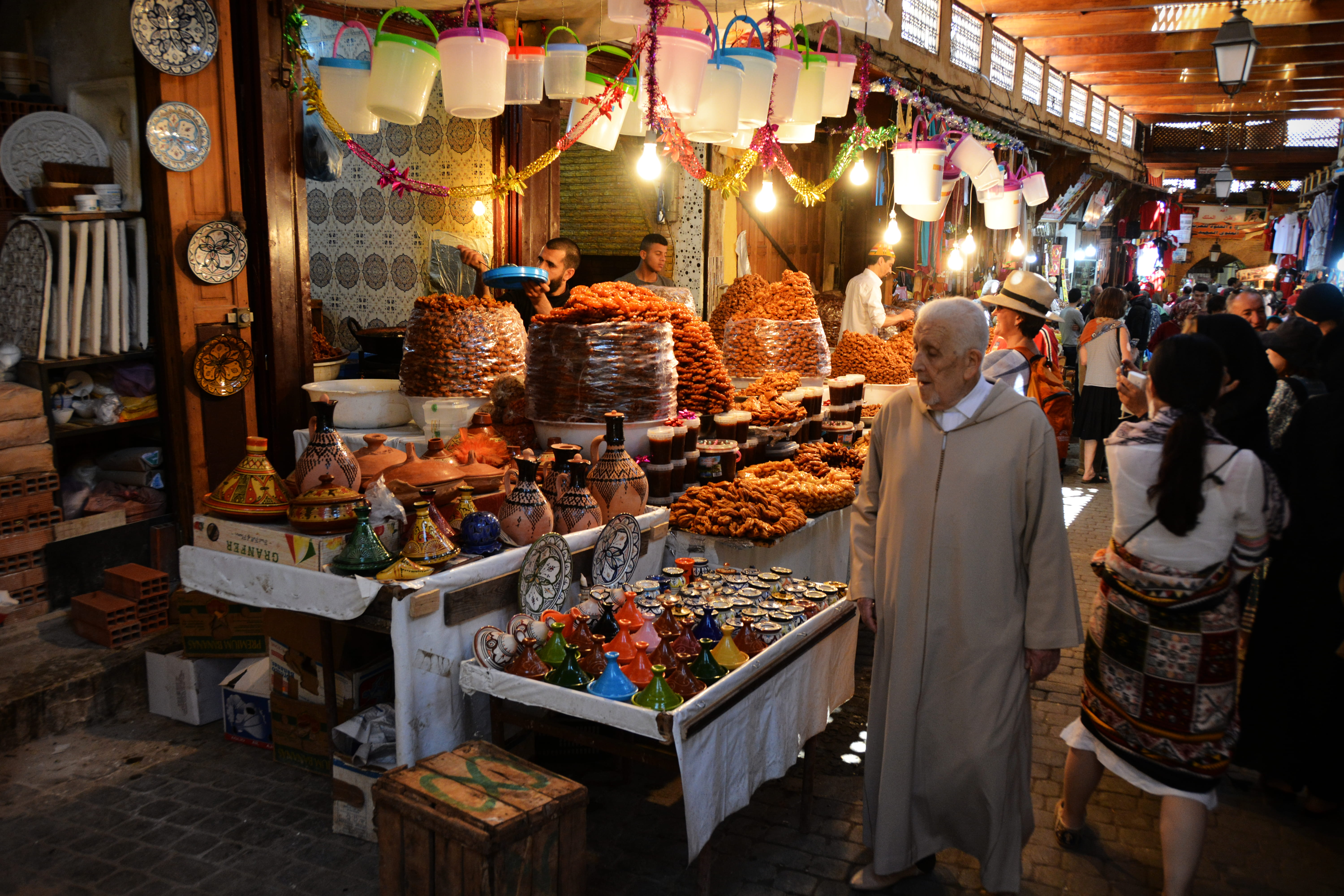 retail display, retail, clock tower, person, fez, bun, lighting ...