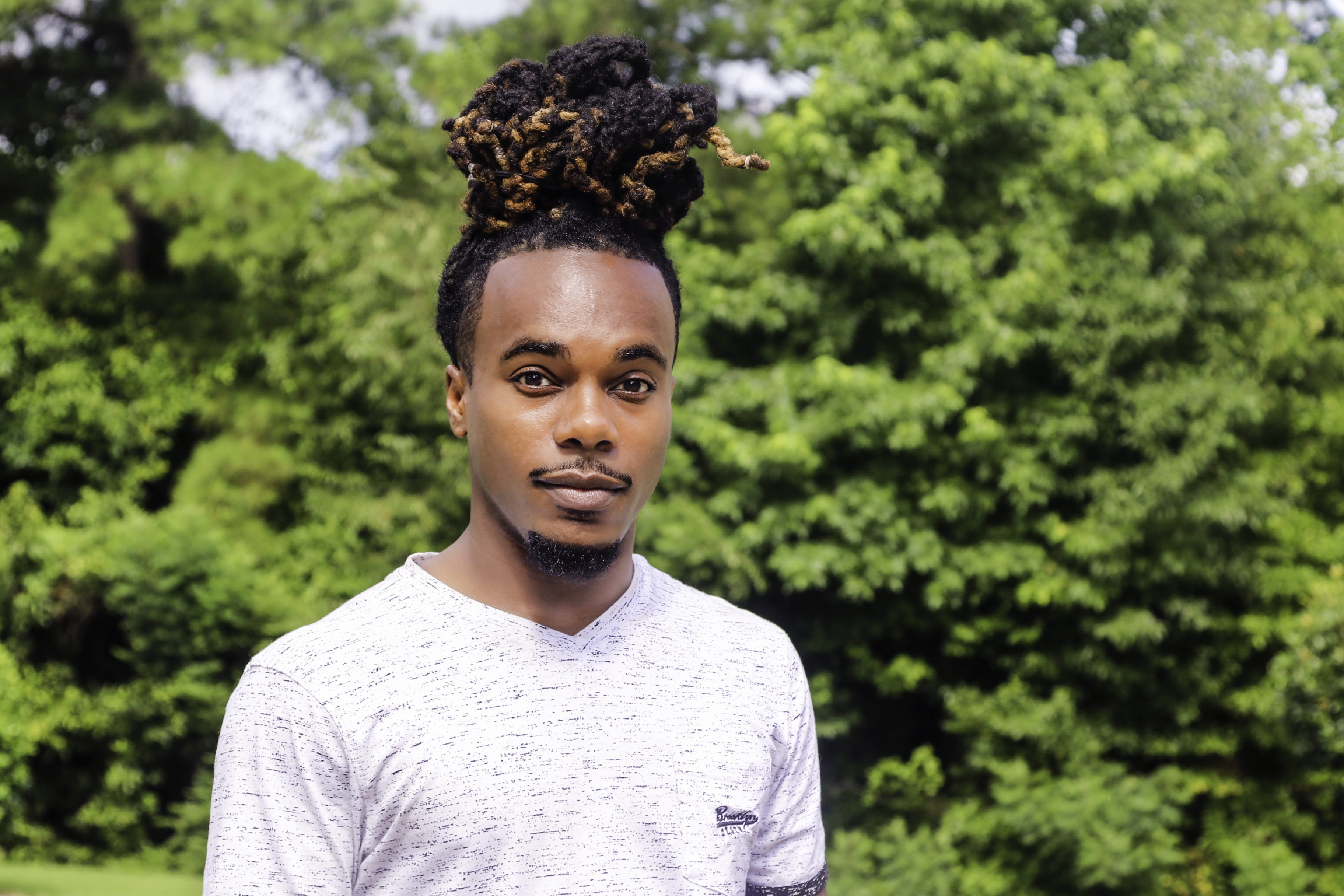 headshot, lifestyles, plant, casual clothing, real people, young adult ...