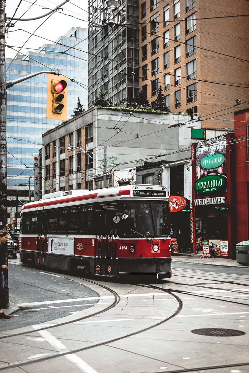 a red trolley car on the tracks in toronto, infrastructure 4k Phone HD ...